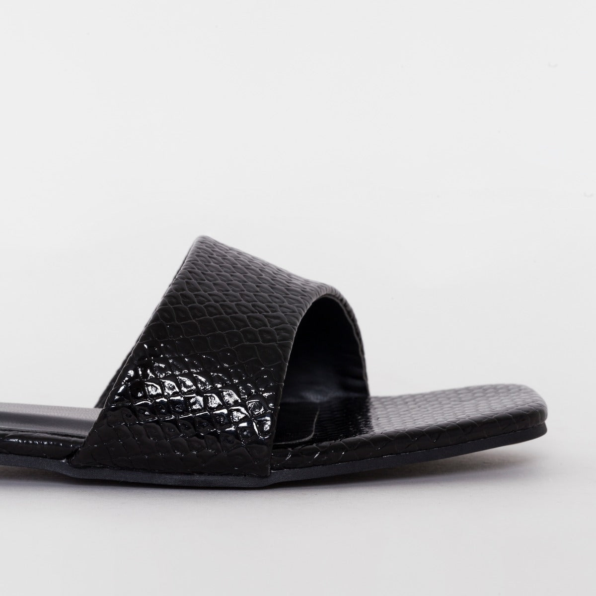 Lola Wide Fit Black Faux Snake Print Sliders | Simmi London