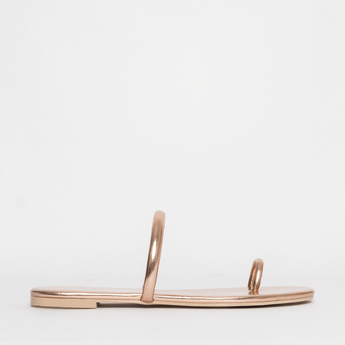 Sofia Rose Gold Toe Loop Flats | Simmi London